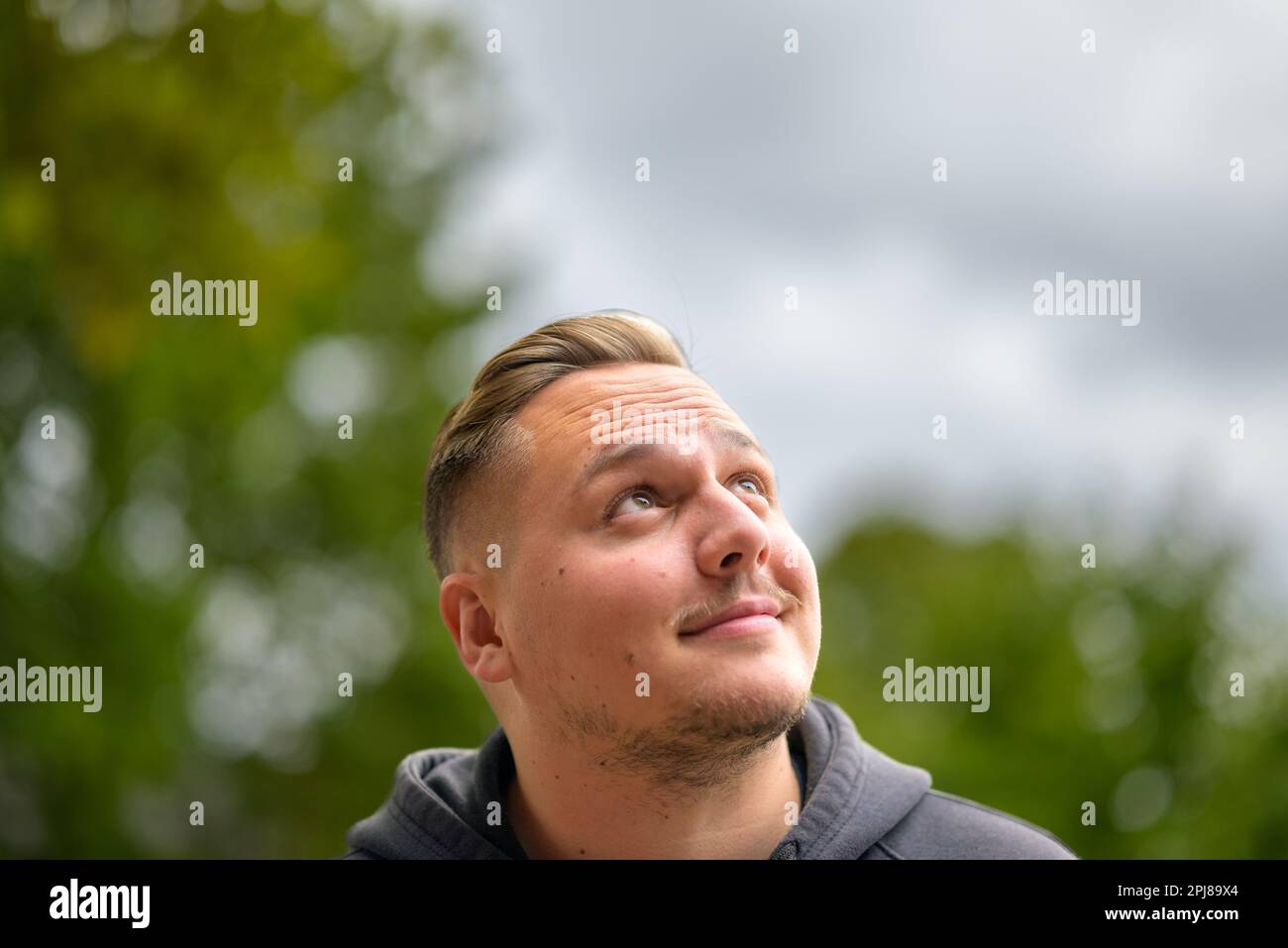 Smile slight hi-res stock photography and images - Alamy
