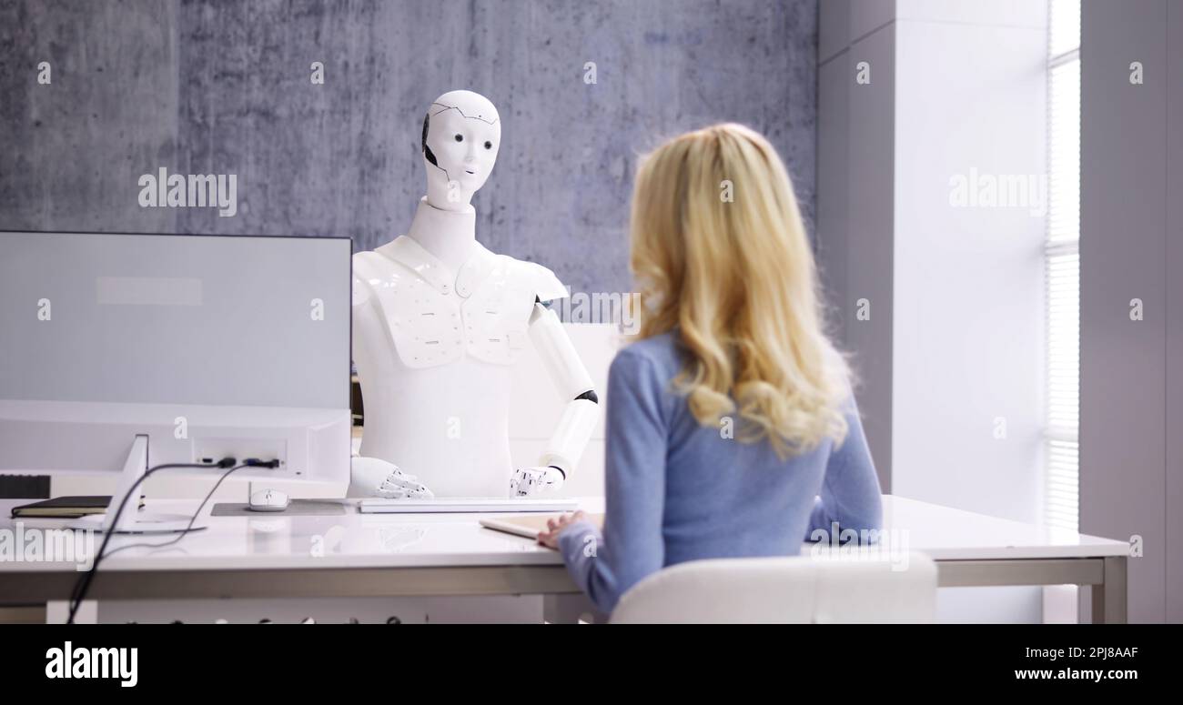 Men At Interview With AI Robot Machine Stock Photo - Alamy