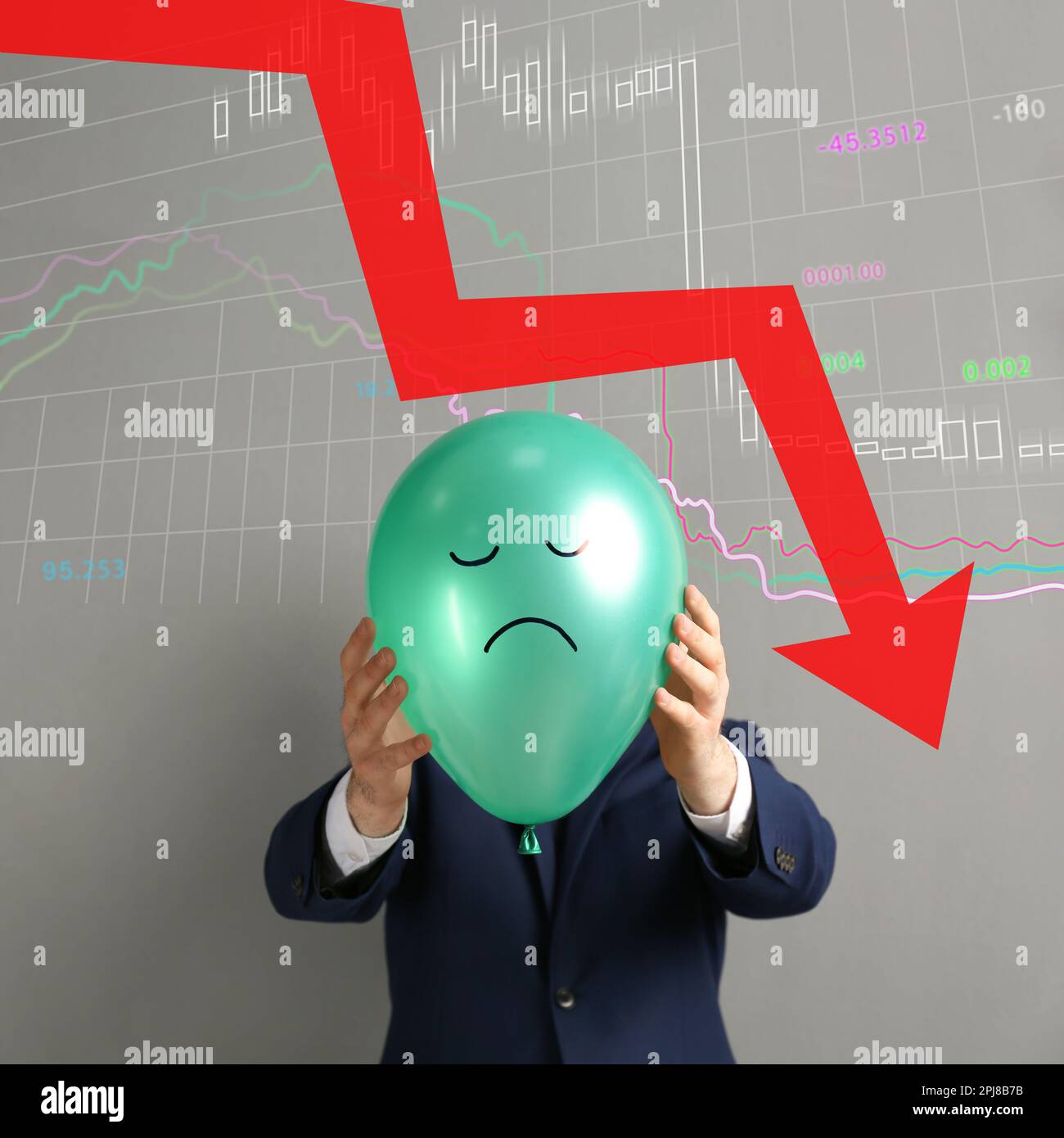 Businessman holding air balloon with drawn sad face and illustration of ...