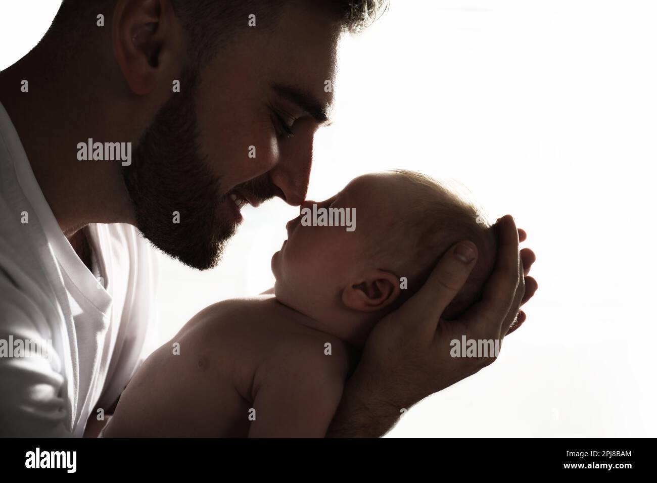 Father with his newborn baby on white background, closeup view Stock ...