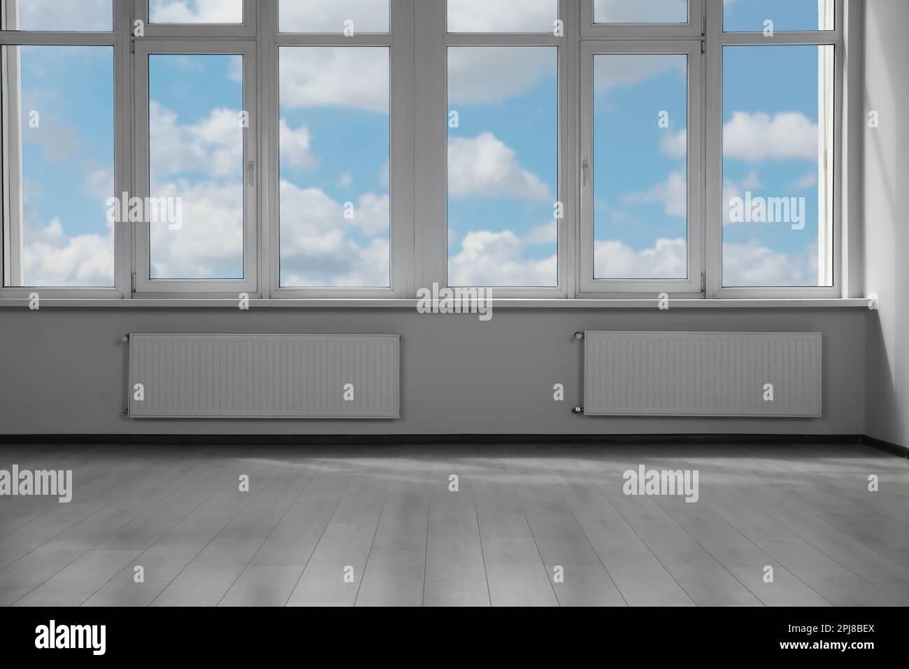 Modern office with window and radiators. Interior design Stock Photo ...