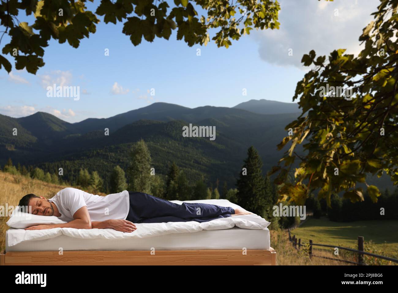 Man sleeping on leaves hi-res stock photography and images - Alamy