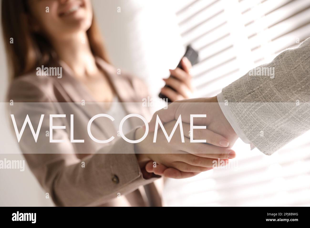 Welcome to team. Employee shaking hands with intern in office, closeup ...