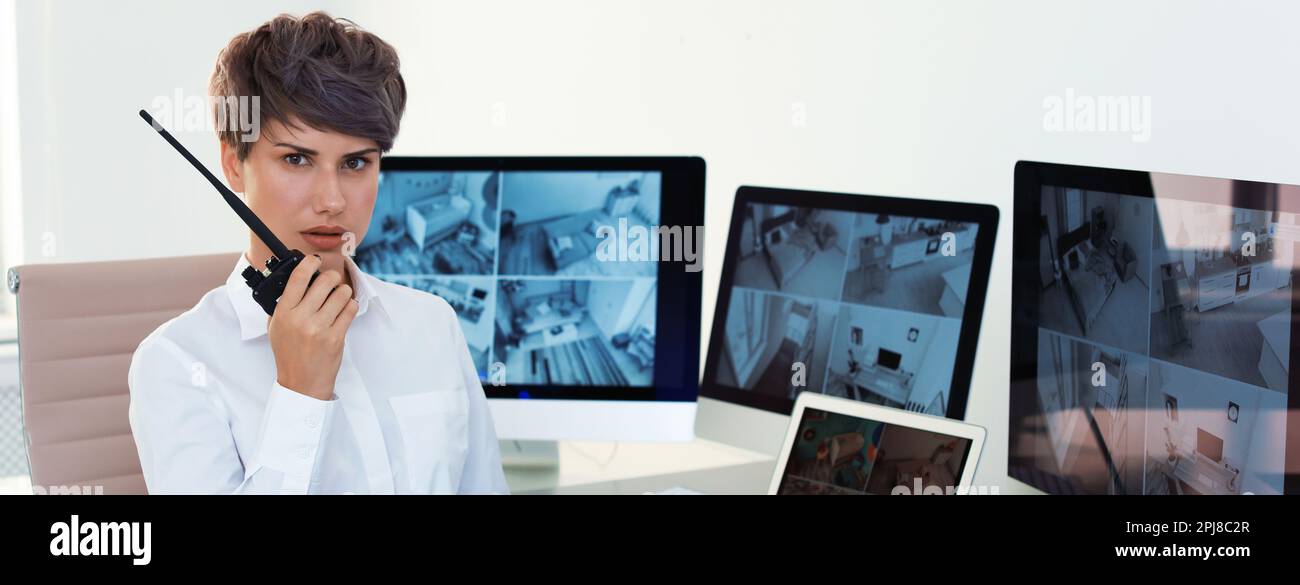 Female security guard using portable transmitter indoors. Banner design ...
