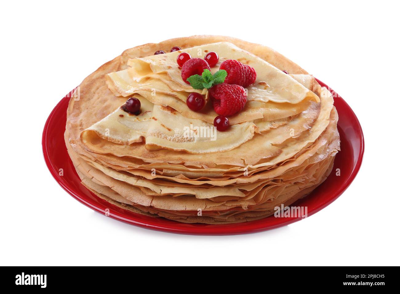 Delicious crepes with berries and mint on white background Stock Photo ...