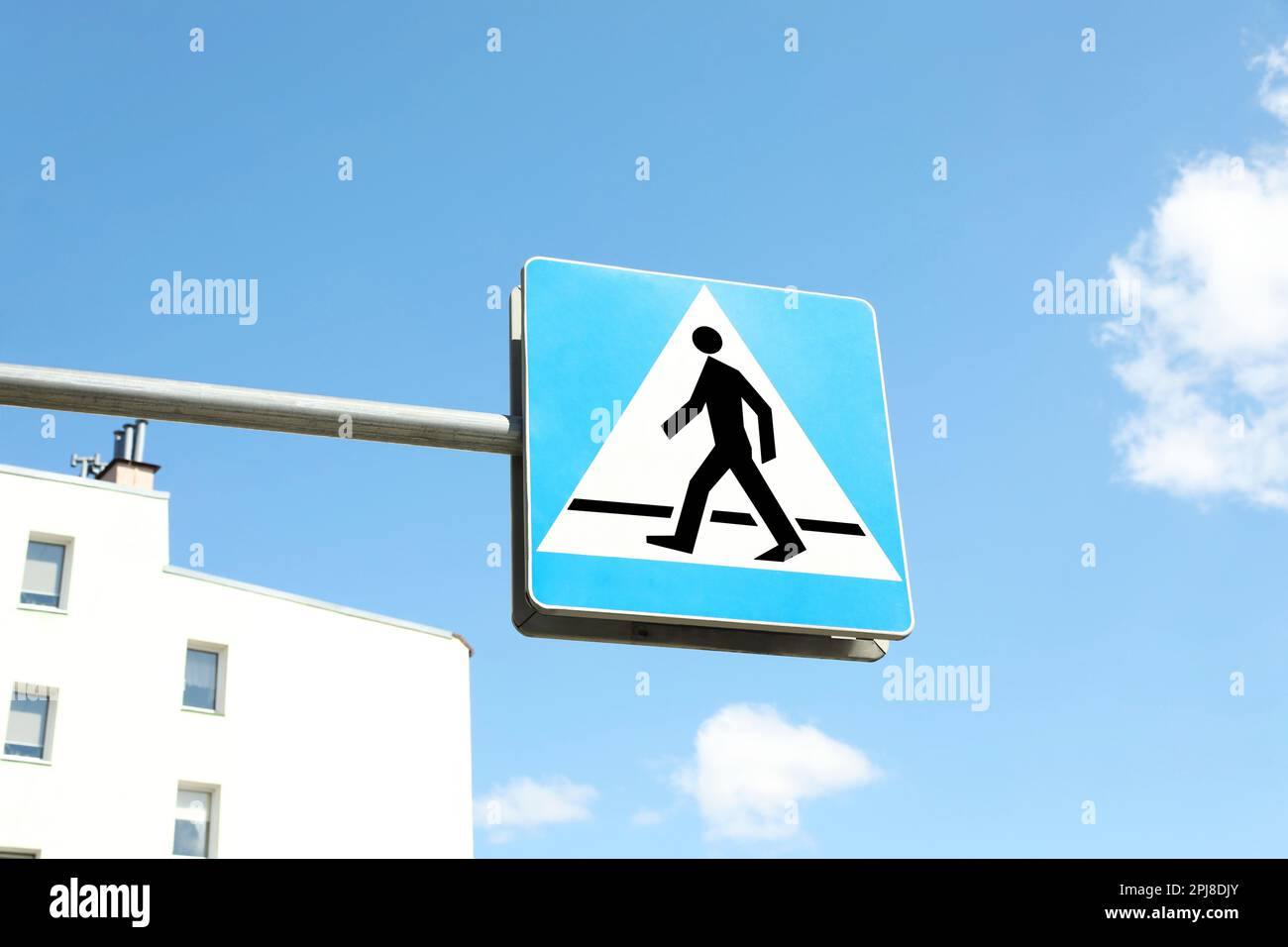 Traffic sign Pedestrian Crossing on city street, low angle view Stock ...