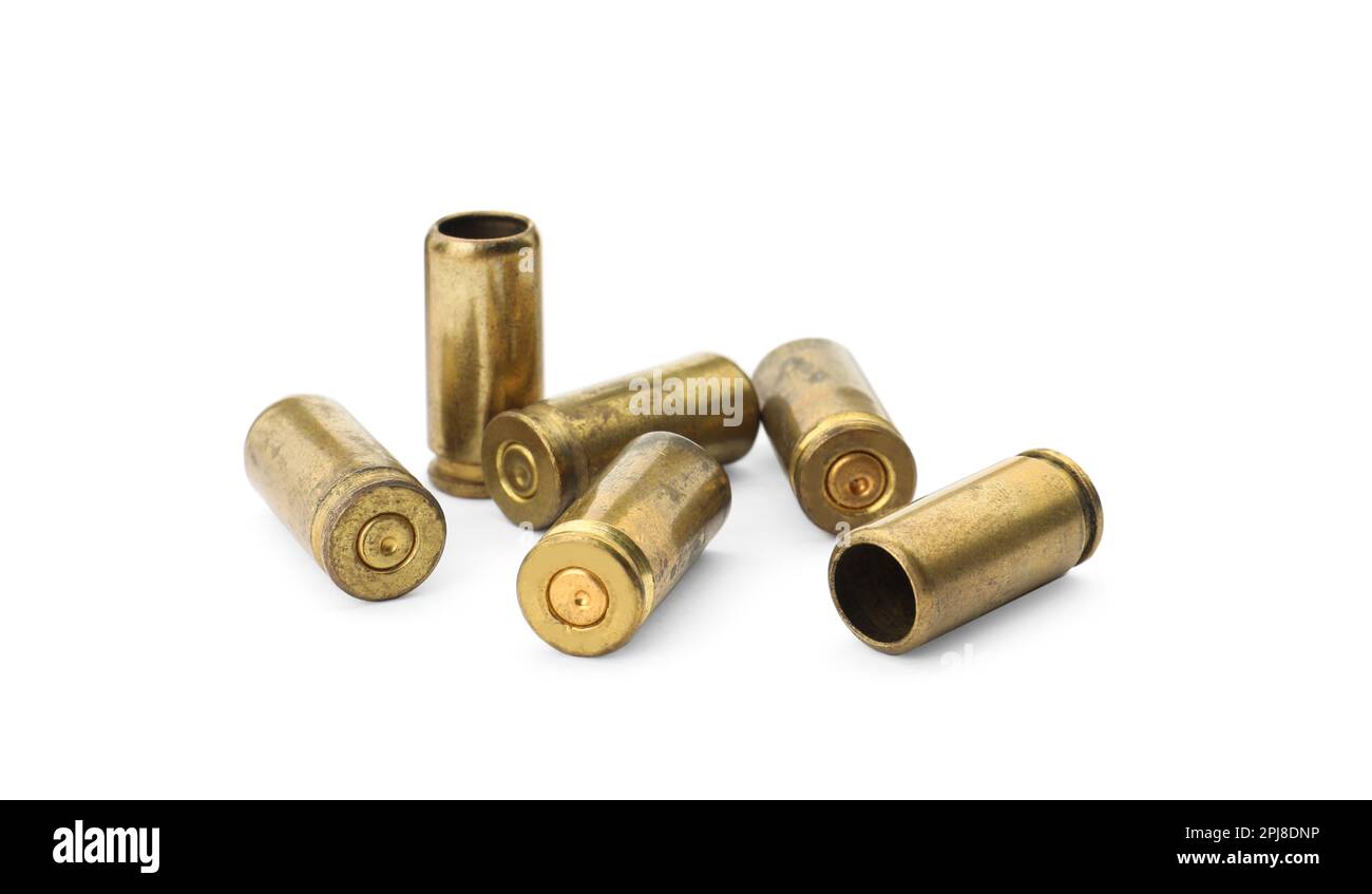Many shells of bullets on white background Stock Photo - Alamy