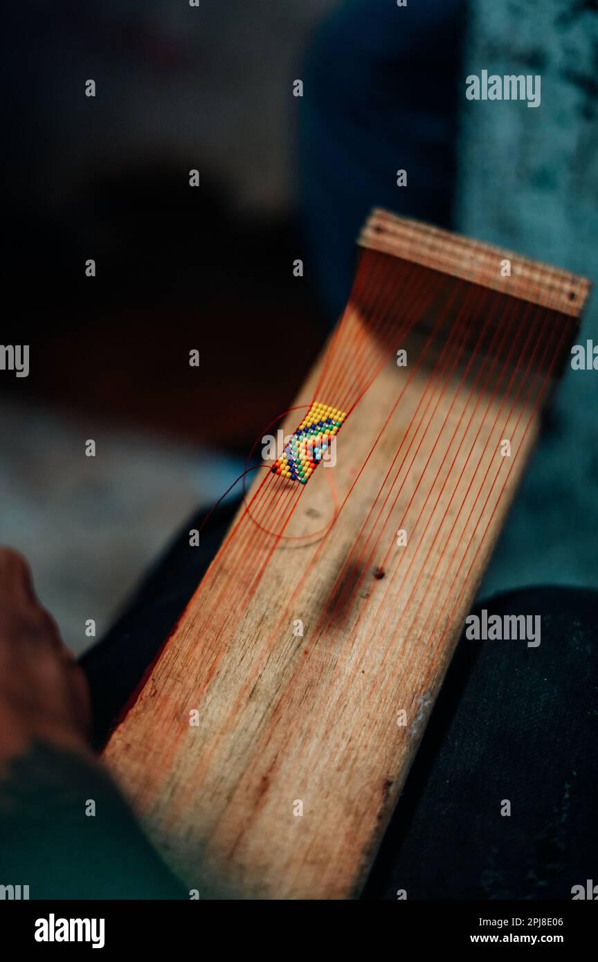 Embera Community of Medellin making Jewelry in Colombia Stock Photo - Alamy