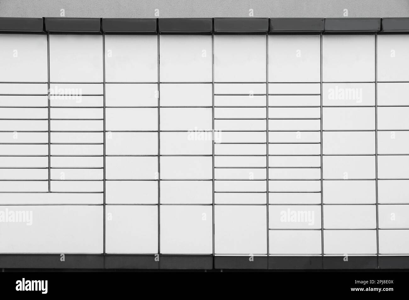 Modern parcel locker with many postal boxes Stock Photo - Alamy