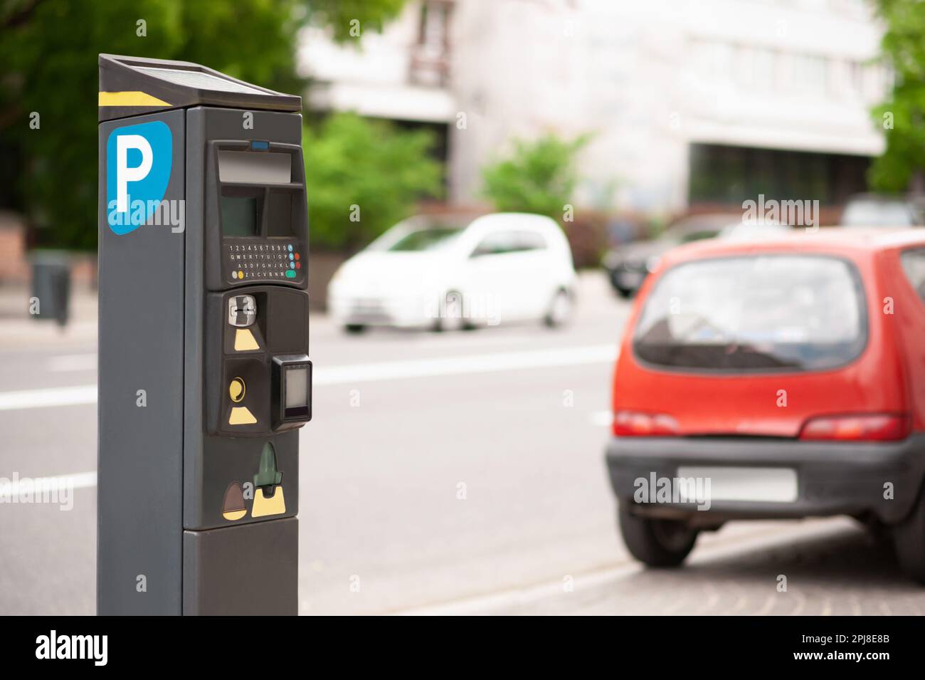 Parking meter on city street, space for text. Modern device Stock Photo ...