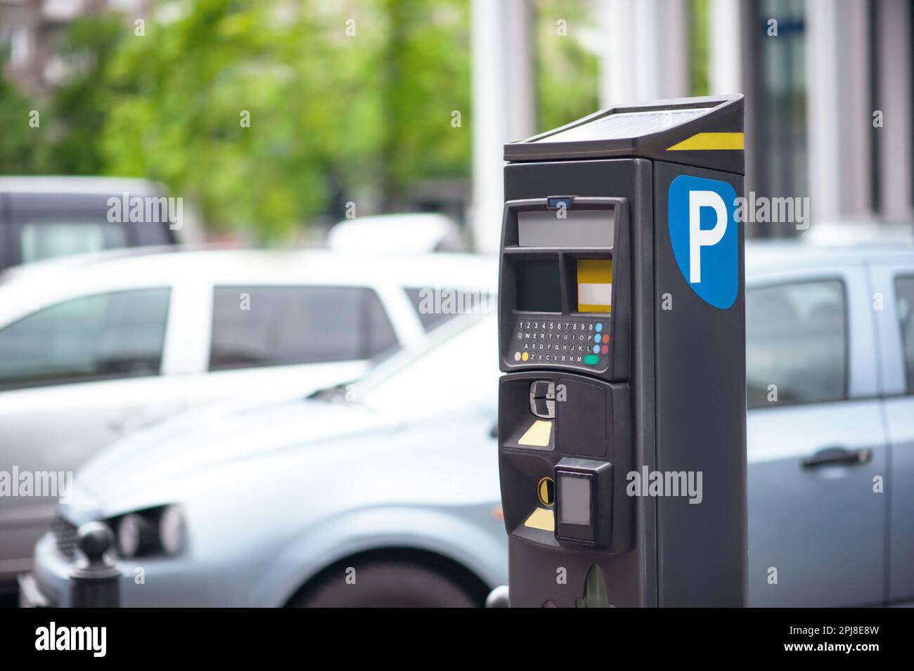 Parking meter on city street, space for text. Modern device Stock Photo ...