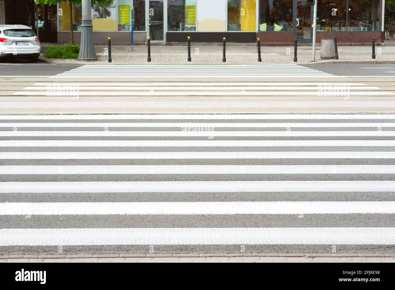 City street with zebra markings. Pedestrian crosswalk Stock Photo - Alamy