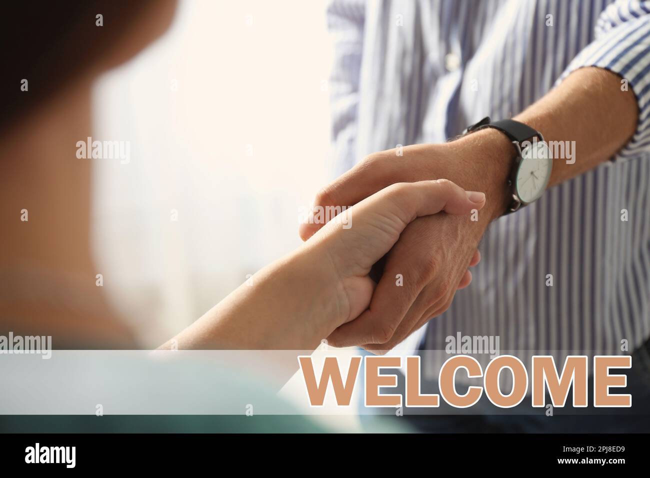 Welcome to team. Employee shaking hands with intern in office, closeup ...