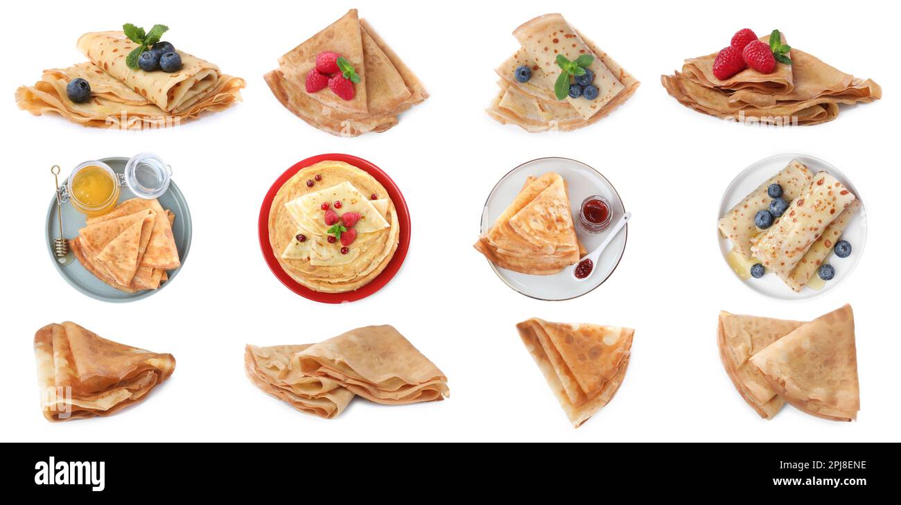 Set of delicious crepes with berries, jam and honey on white background ...