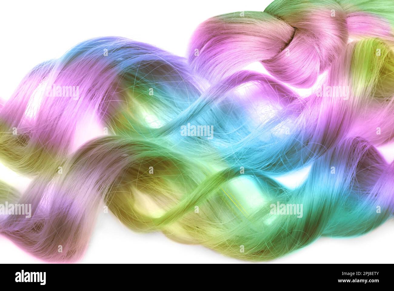 Beautiful curly multicolored hair on white background Stock Photo - Alamy