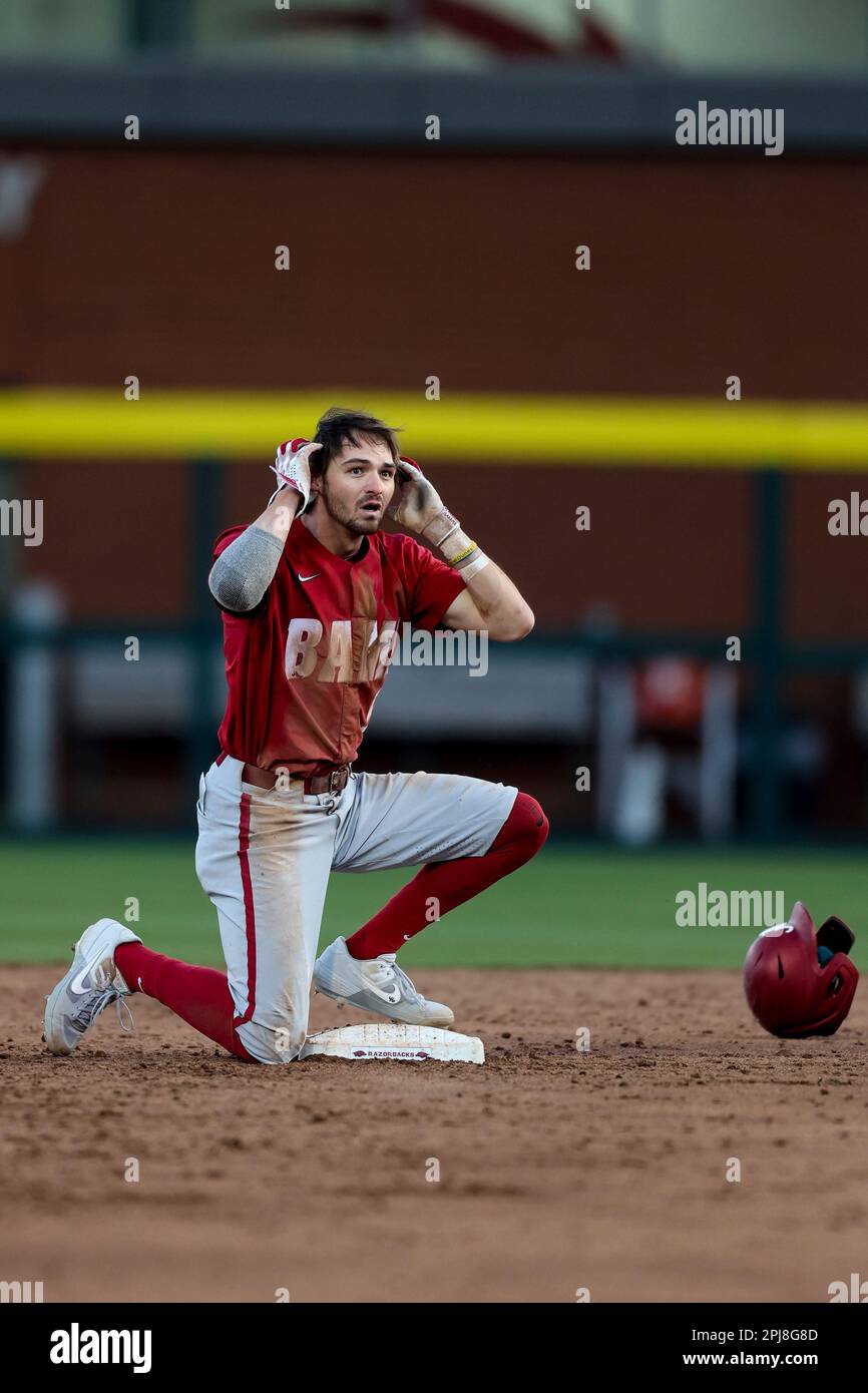 March 31, 2023: Ed Johnson #5 of Alabama signals to the dugout to have ...