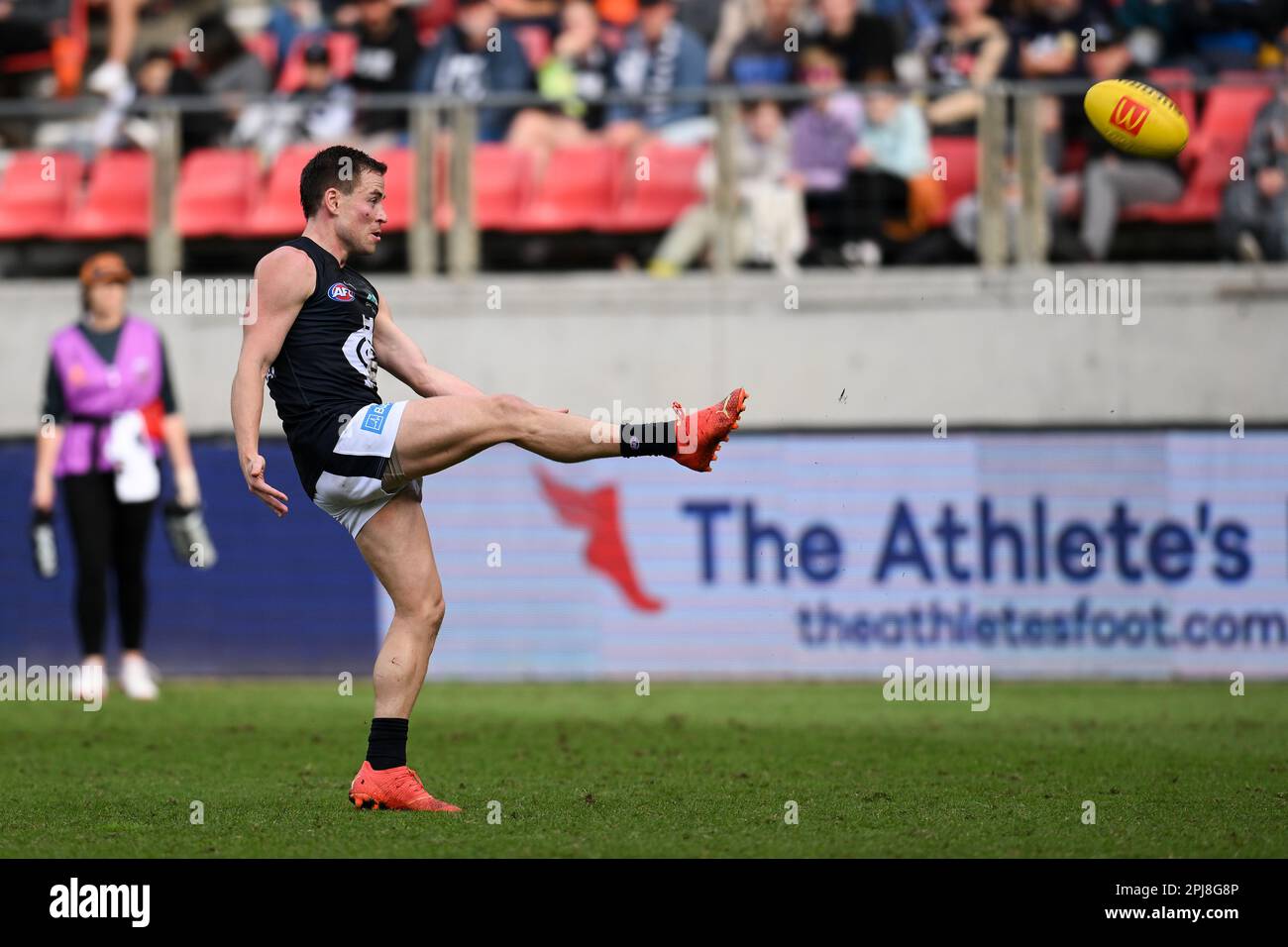 Matthew Owies of Carlton kicks a goal during the AFL Round 3 match ...
