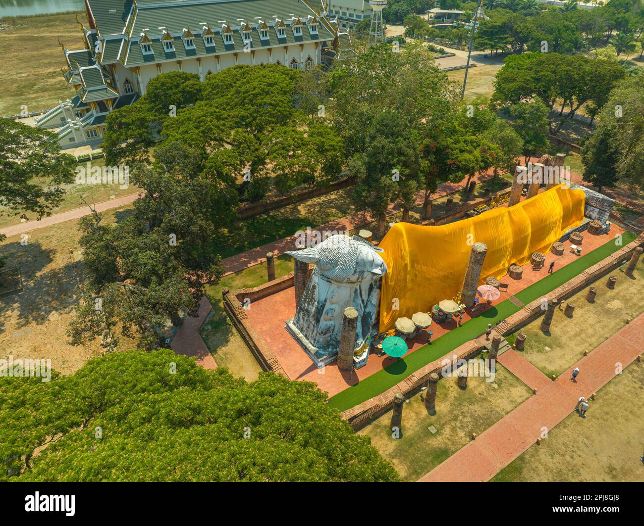 aerial view above the big beautiful reclining Buddha at Wat Khun ...