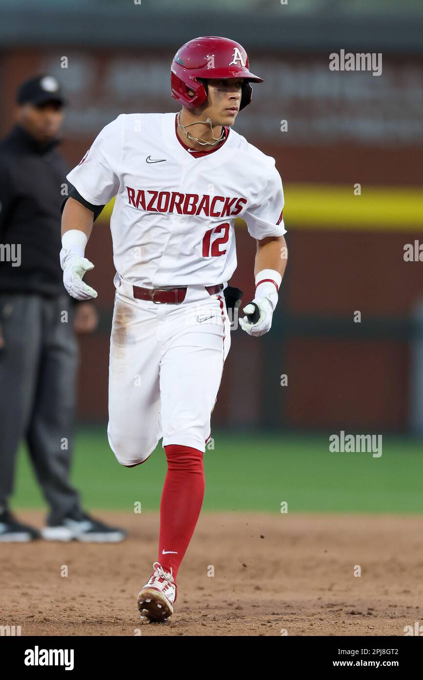 March 31, 2023: Arkansas base runner Tavian Josenberger #12 moves ...