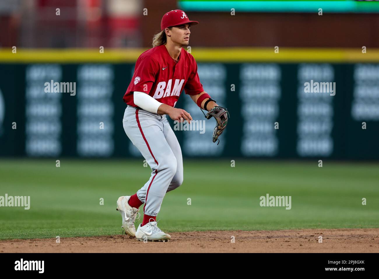 March 31, 2023: Alabama infielder Jim Jarvis #10 bounces around as the ...