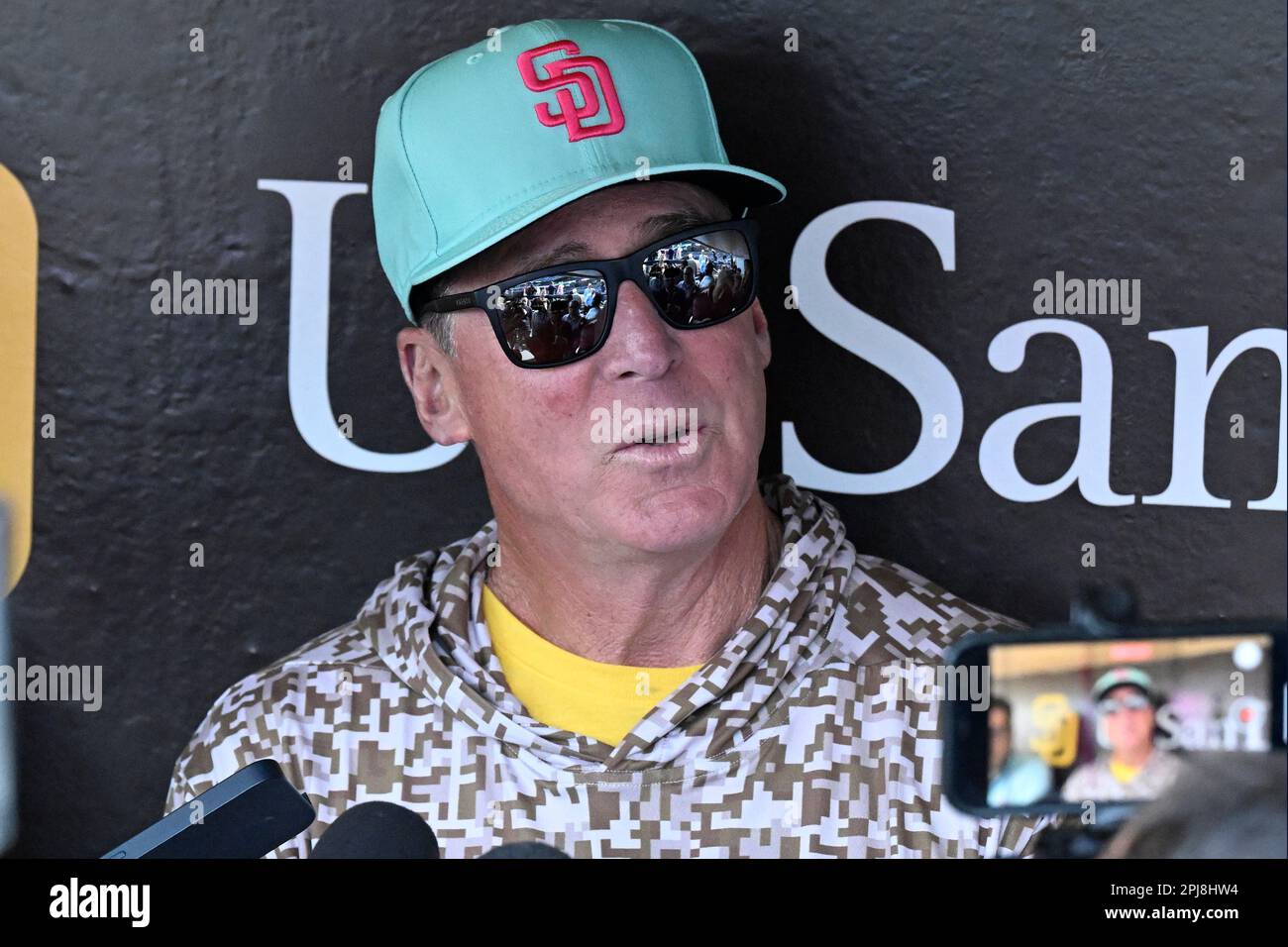 San Diego Padres manager Bob Melvin talks with the media in the dugout before a baseball game ...