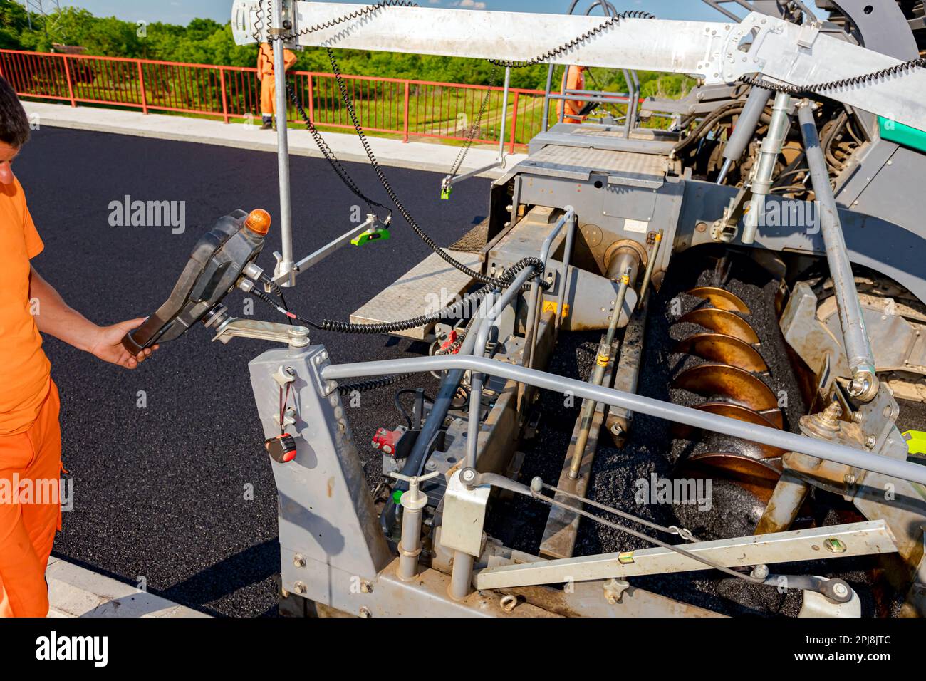 Operator, worker is holding industrial remote control, console with ...