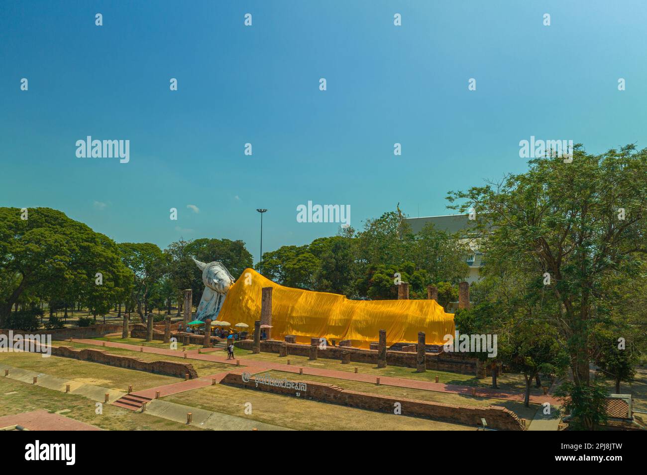aerial view above the big beautiful reclining Buddha at Wat Khun ...