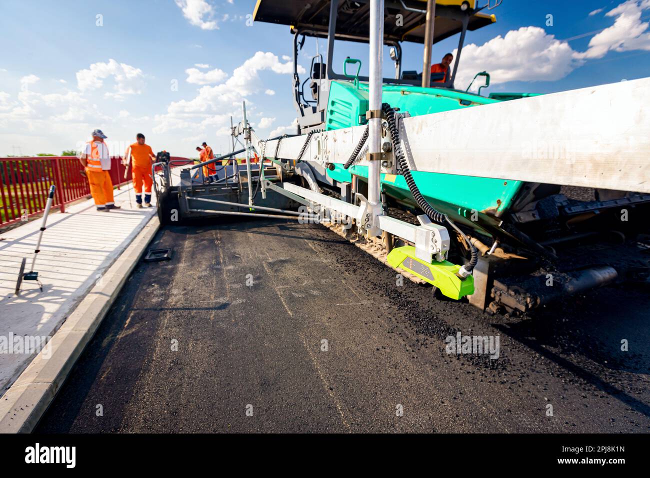 Road laying construction machine with ultrasonic grade, slope, non ...