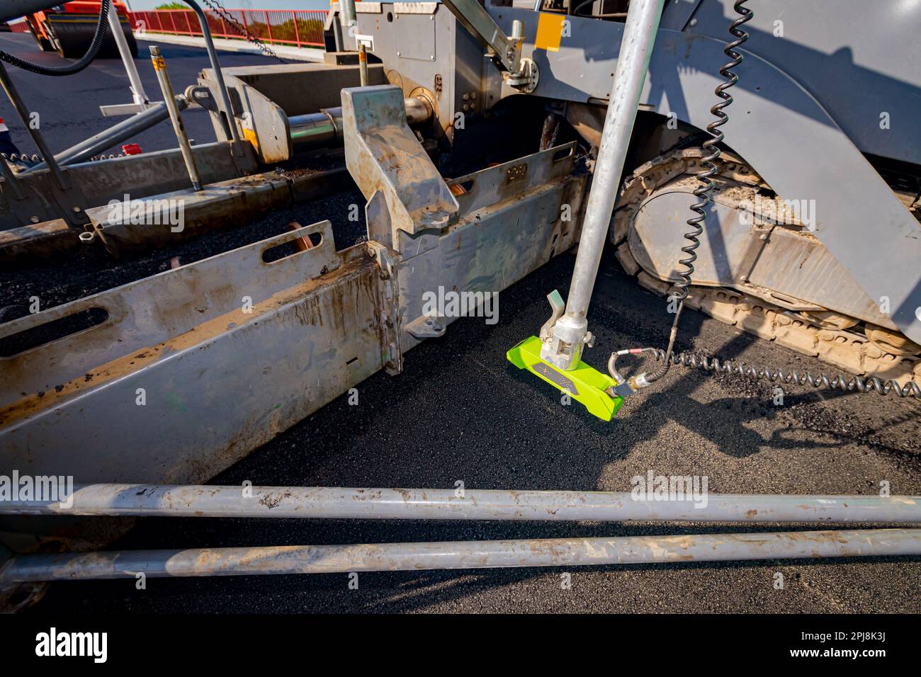 Road laying construction machine with ultrasonic grade, slope, non ...