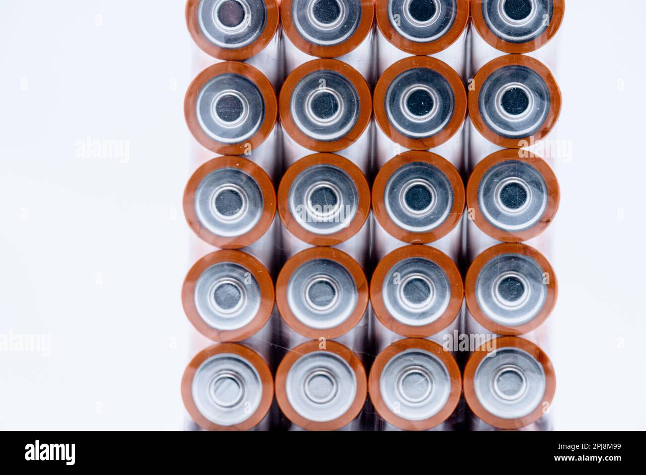 Four stacks of AA alkaline batteries Stock Photo - Alamy