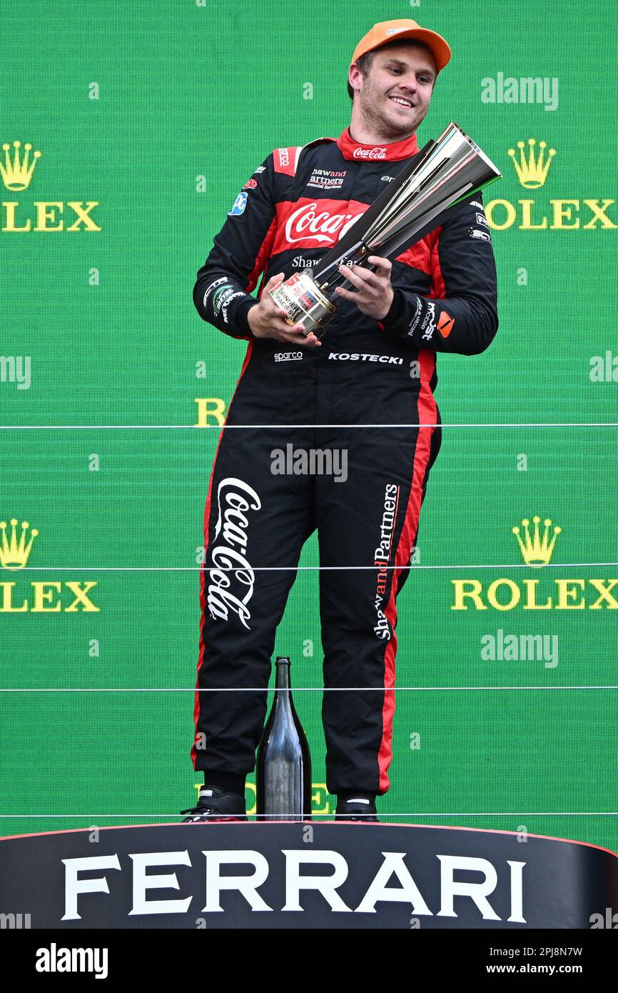 Brodie Kostecki of Coca-Cola Racing celebrates on the podium after ...