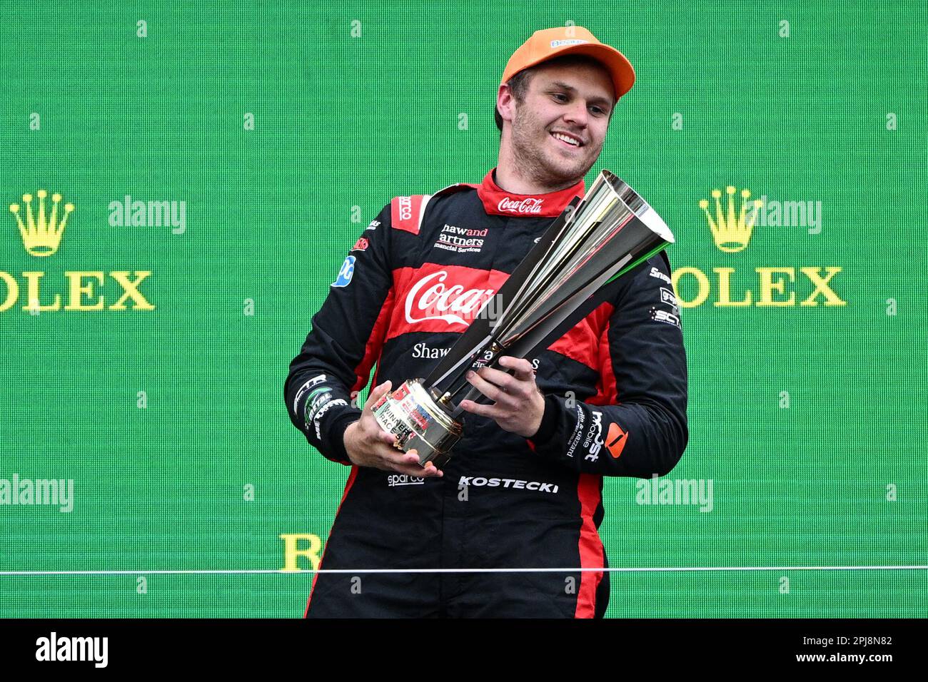 Brodie Kostecki of Coca-Cola Racing celebrates on the podium after ...
