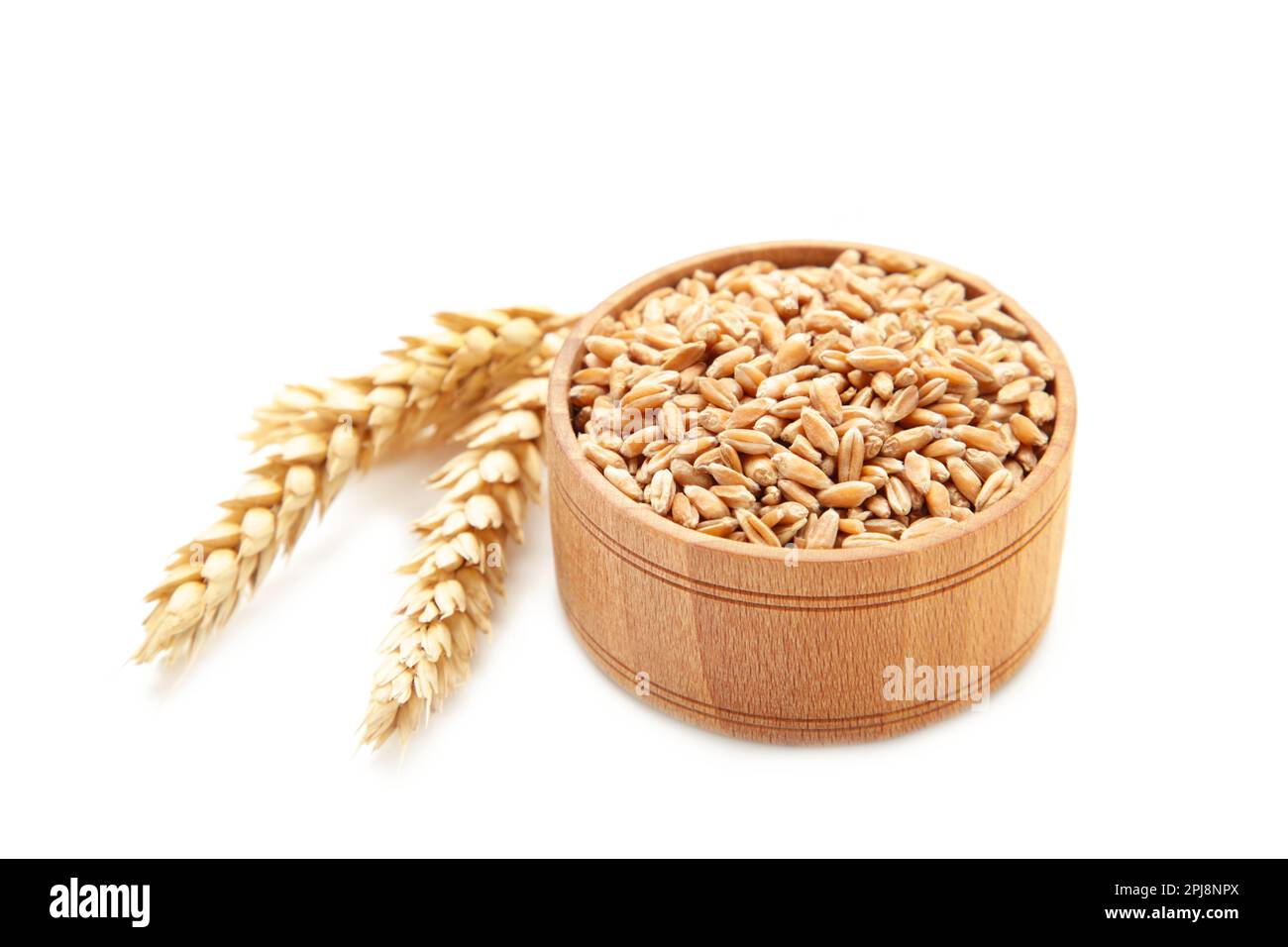 Spikelets of wheat with wheat in bowl isolated on white background ...