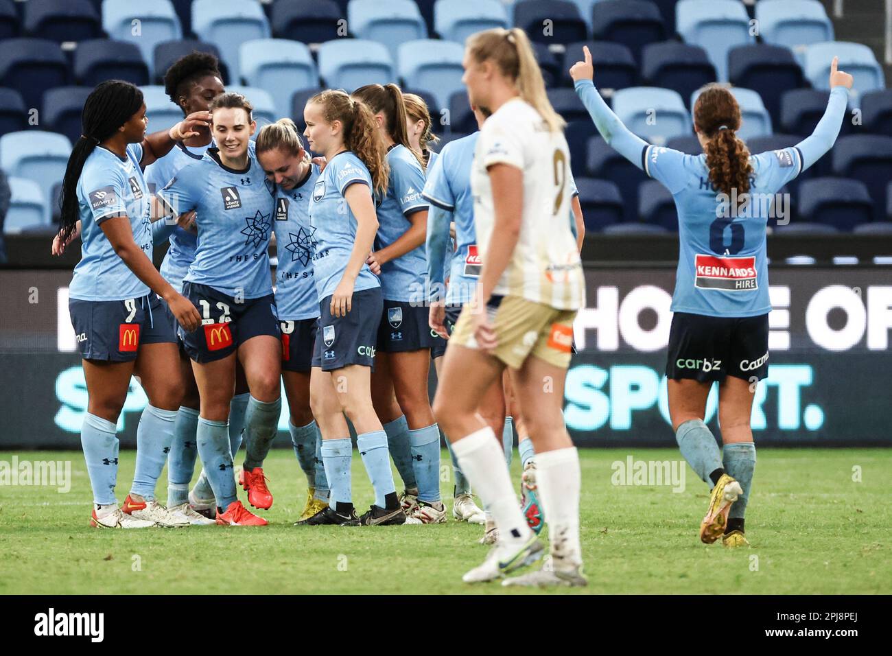 Sydney’s Mackenzie Hawkesby (C) celebrates with team mates after ...
