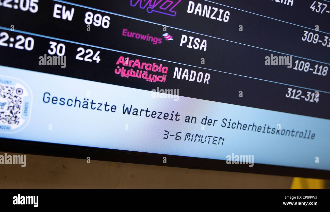 Cologne, Germany. 01st Apr, 2023. A display screen provides information ...