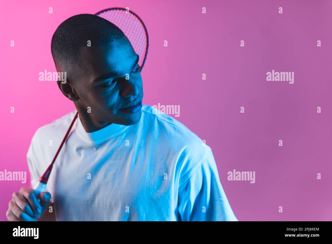 Racket sport concept. Stunning indoor portrait of young adult male ...
