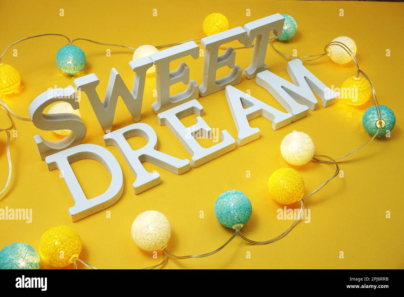 Sweet Dream alphabet letter with LED cotton balls on yellow background ...