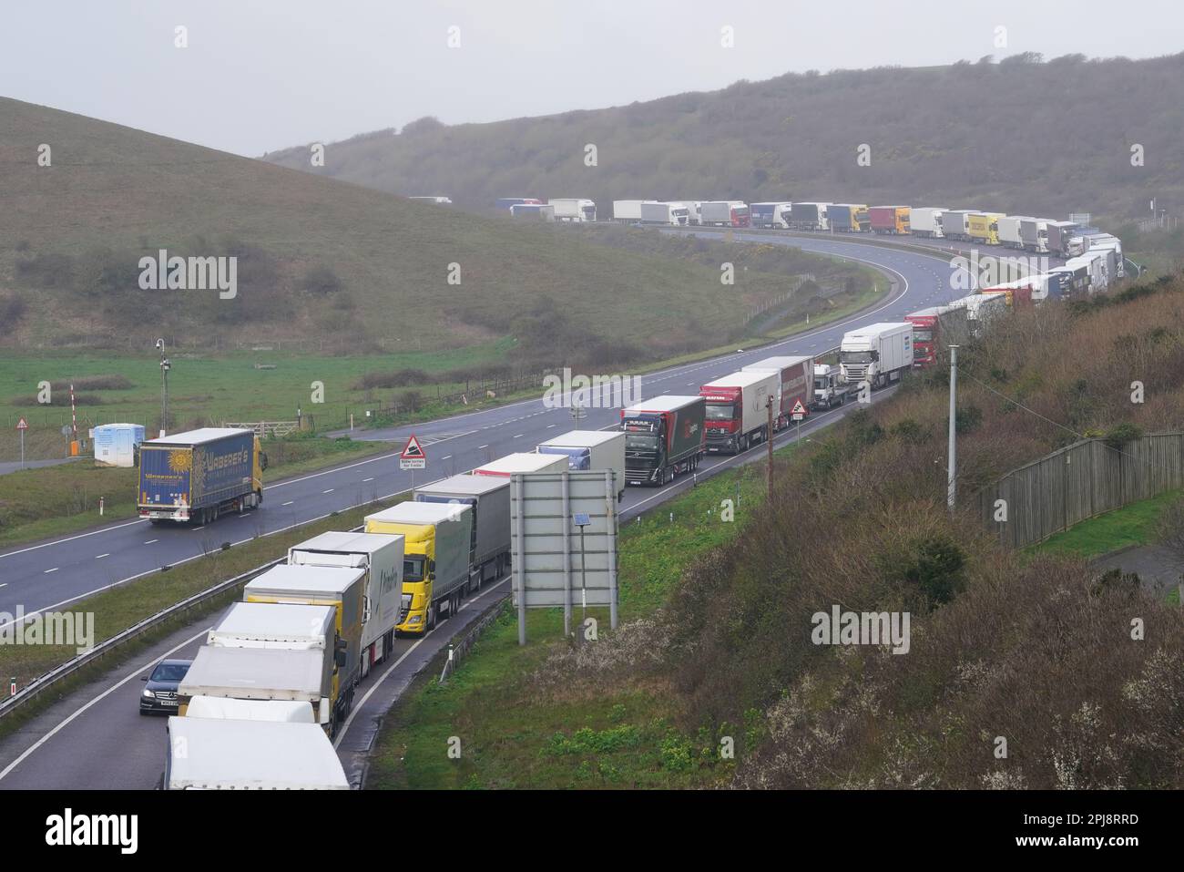 Lorries queueing on the A20 to get to the Port of Dover in Kent as the ...
