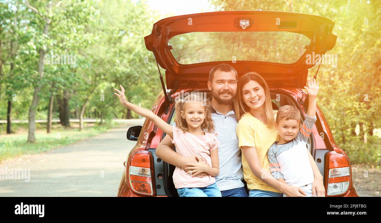 Happy family with children and car, outdoors. Banner design Stock Photo ...