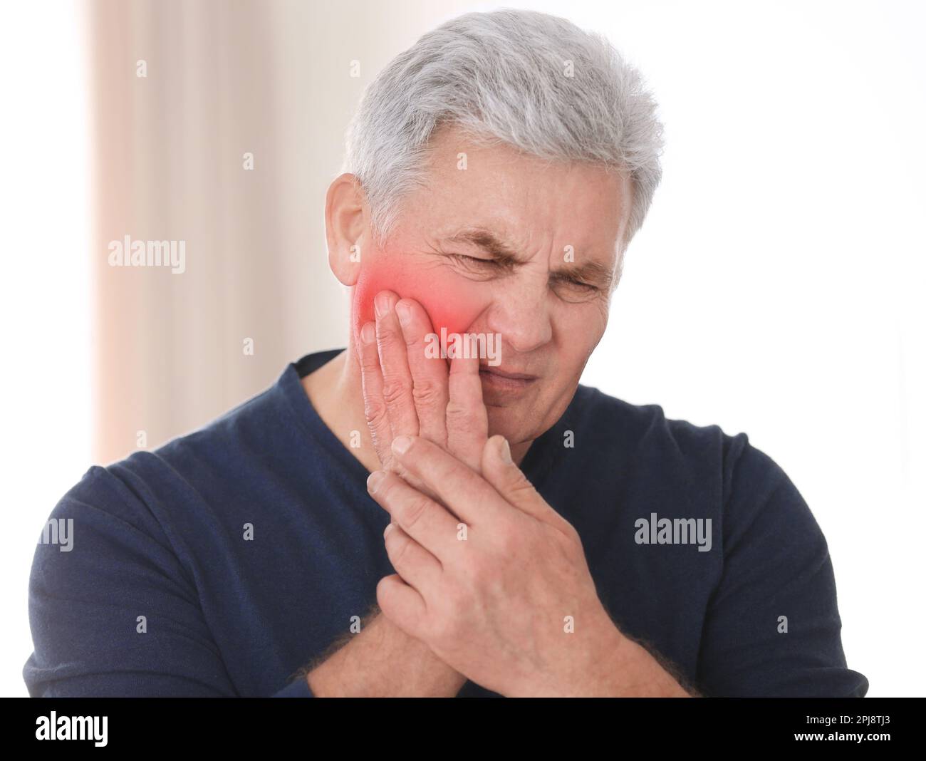 Mature adult man toothache home hi-res stock photography and images - Alamy