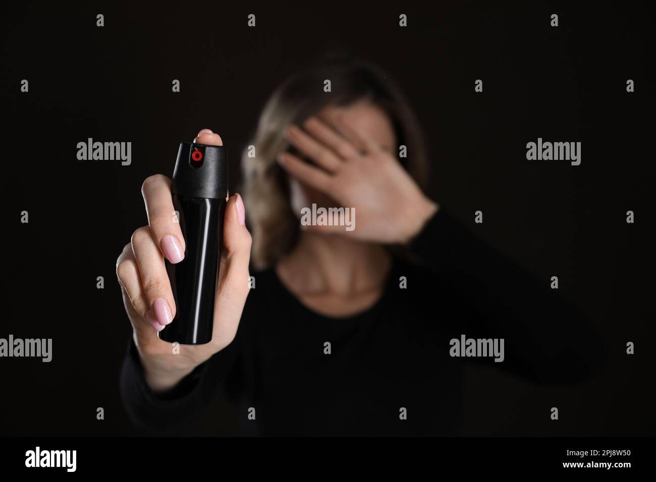 Black woman pepper spray hi-res stock photography and images - Alamy