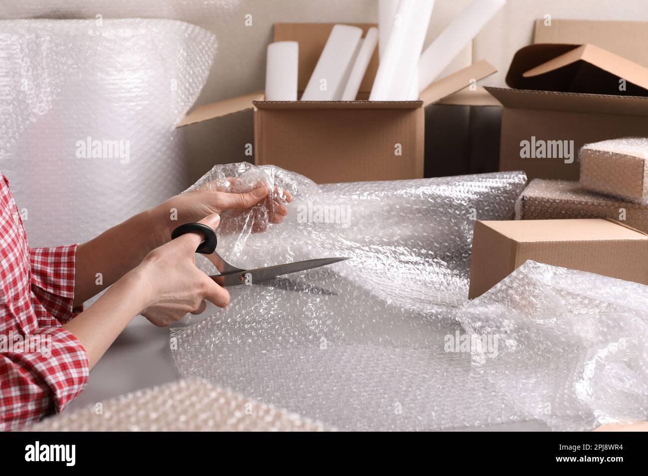 Person in bubble wrap hi-res stock photography and images - Alamy
