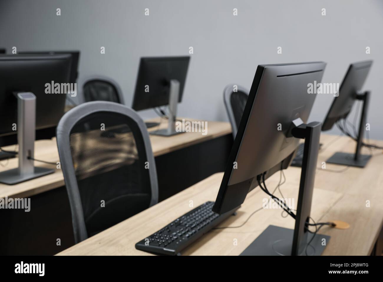 Many modern computers in open space office Stock Photo - Alamy