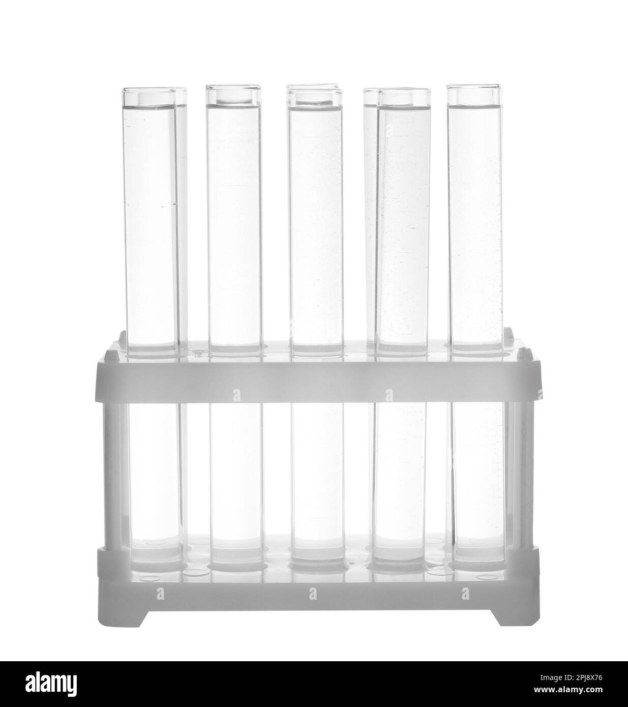 Test tubes with transparent liquid in holder isolated on white Stock ...