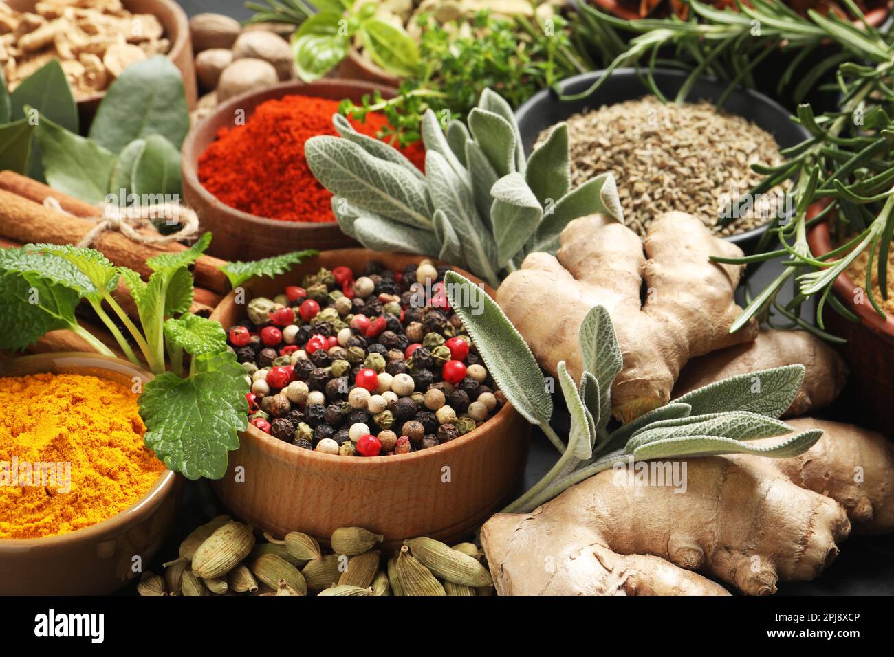 Different fresh herbs and spices as background, closeup Stock Photo - Alamy