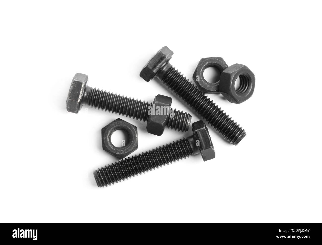Metal bolts and nuts on white background, top view Stock Photo - Alamy