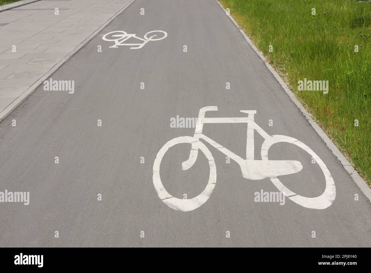 Two way bicycle lane on asphalt road outdoors Stock Photo - Alamy