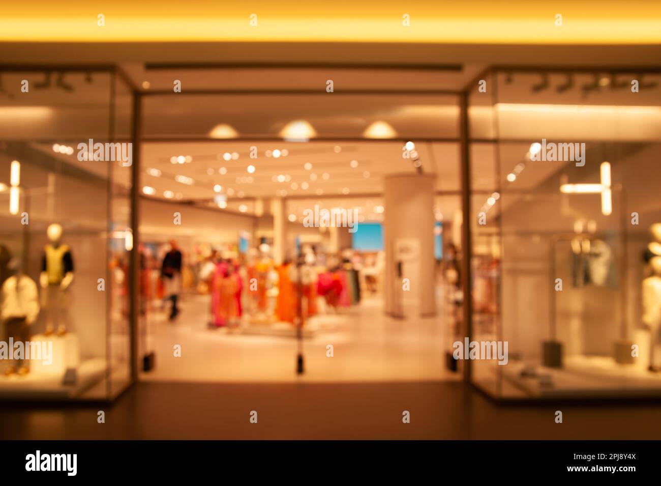 Blurred view of clothing store, bokeh effect Stock Photo - Alamy