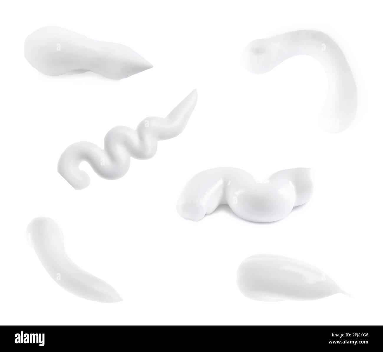 Set with smears of toothpaste on white background Stock Photo - Alamy