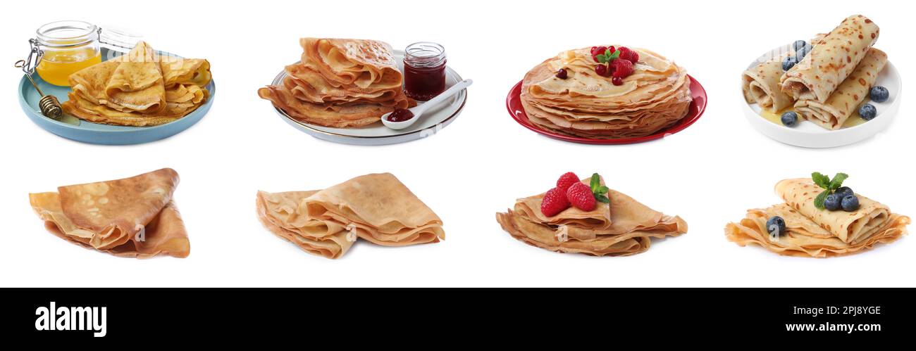 Set of delicious crepes with berries, jam and honey on white background ...